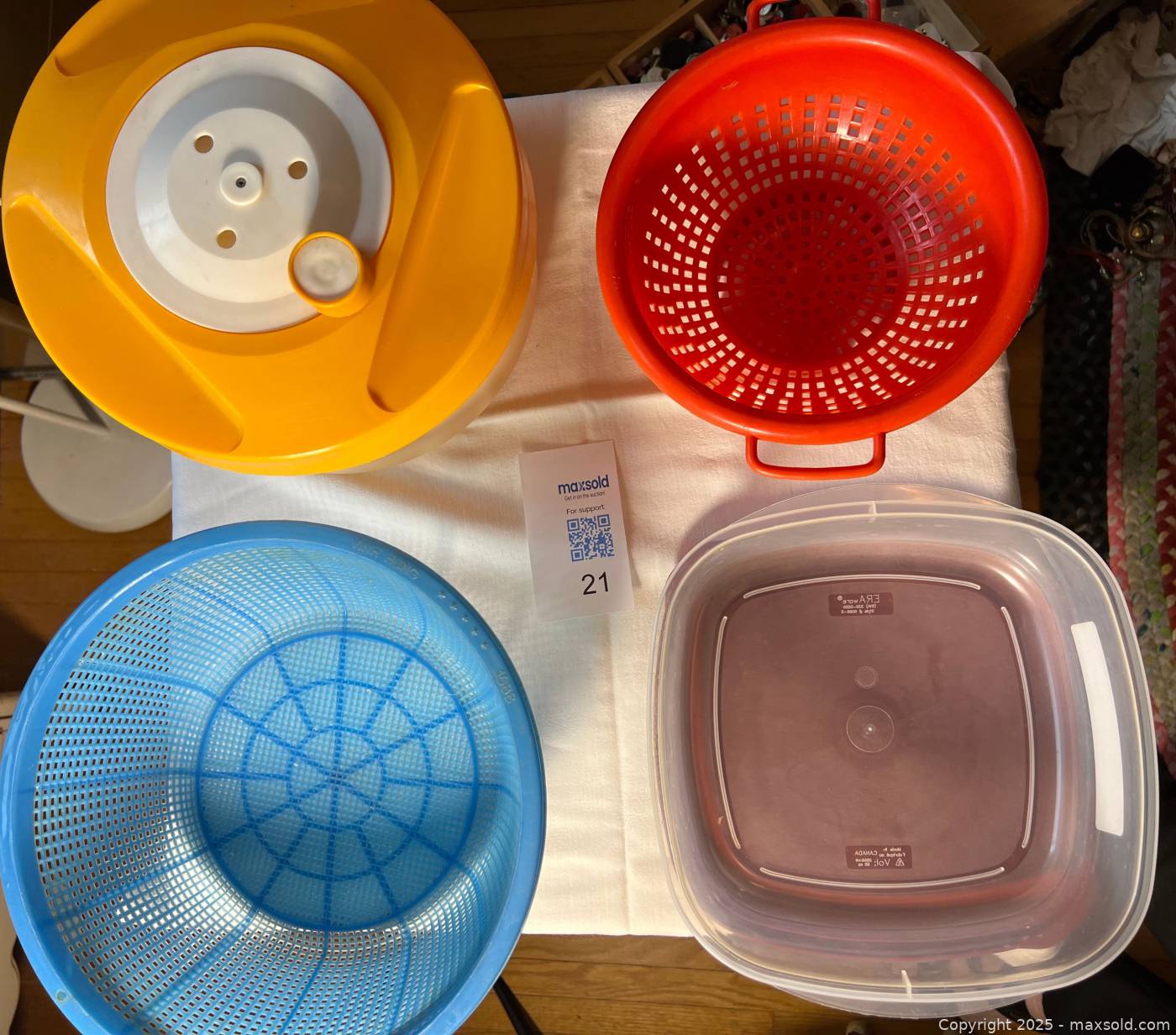 Plastic salad spinner, colanders, bin | Maxsold