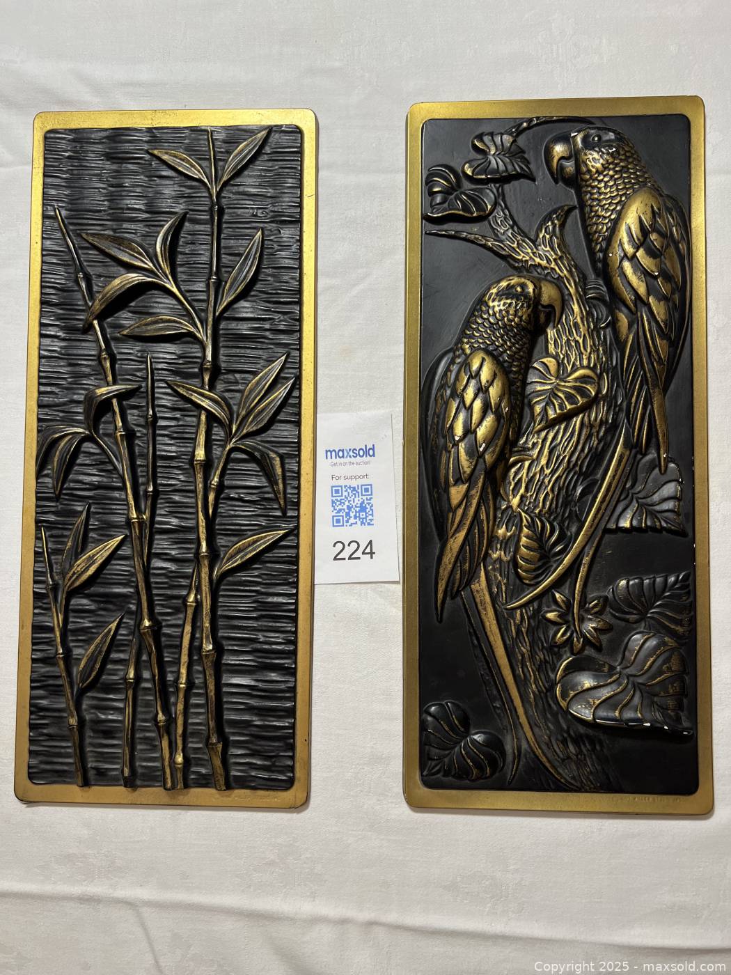 Pair of 7in x 17in moulded plastic wall plaques | Maxsold